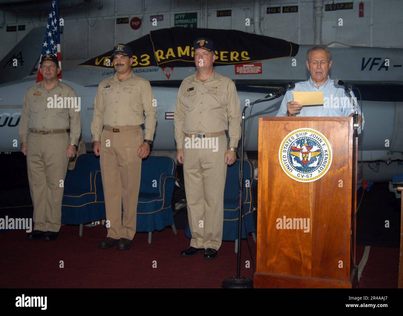 US Navy Secretary of Defense (SECDEF) Donald H. Rumsfeld speaks to the ...