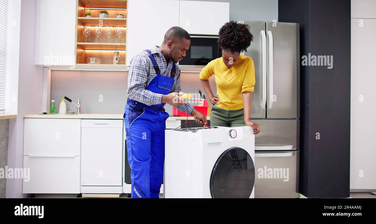 African american technician repairing hi-res stock photography and ...