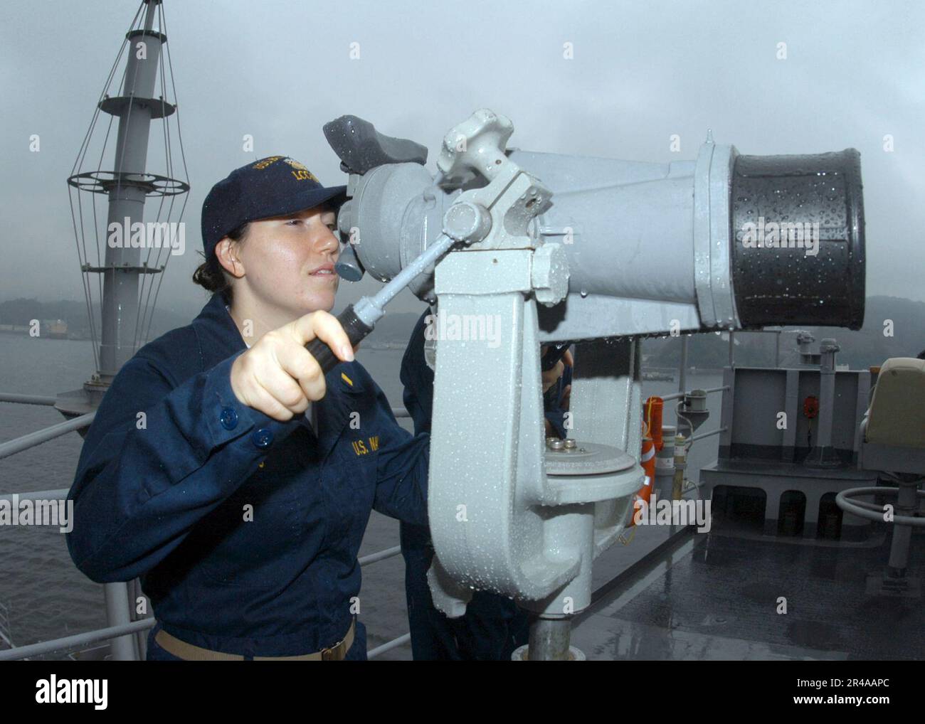 US Navy Ens. Alexandria Myers scans the horizon for contacts using the ...