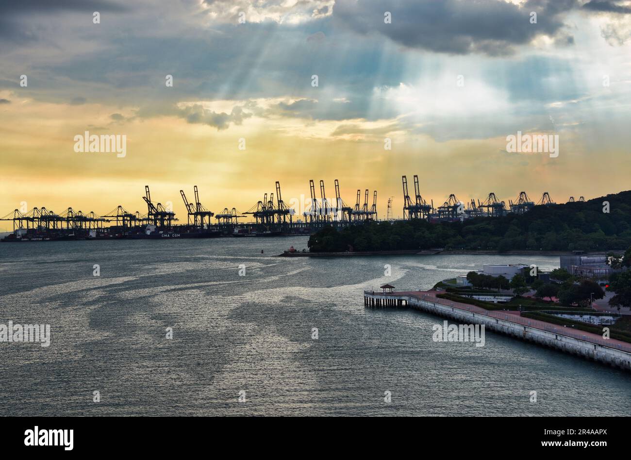 An aerial shot of a bustling port and harbor with several boats docked ...