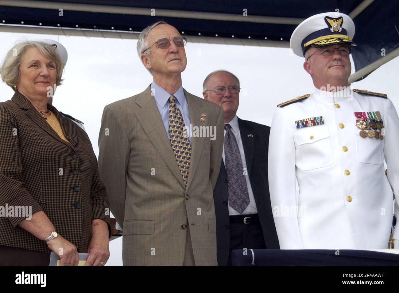 US Navy Mrs. Dorothy England and SECNAV stand with Rear Adm. Charles D ...
