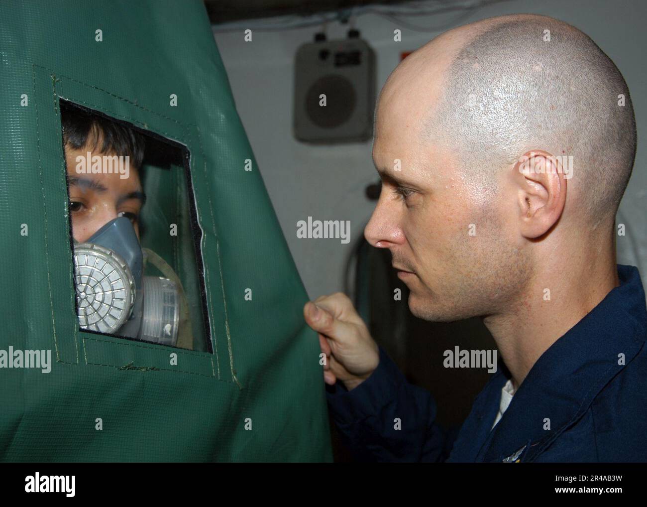 US Navy Machinist Mate 1st Class assigned to the Safety Department ...