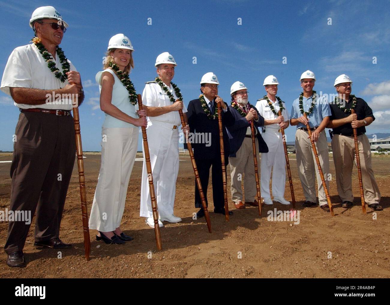 US Navy Members of the official party prepare to break ground during a ...