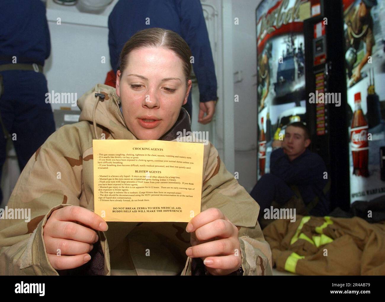 US Navy Personnelman 1st Class Stephanie Jackson reads the Chemical ...