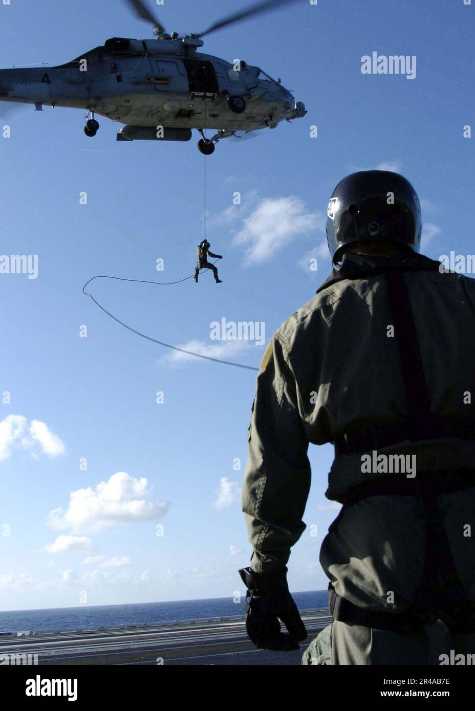 US Navy Personnel assigned to Explosive Ordnance Disposal Mobile Unit ...