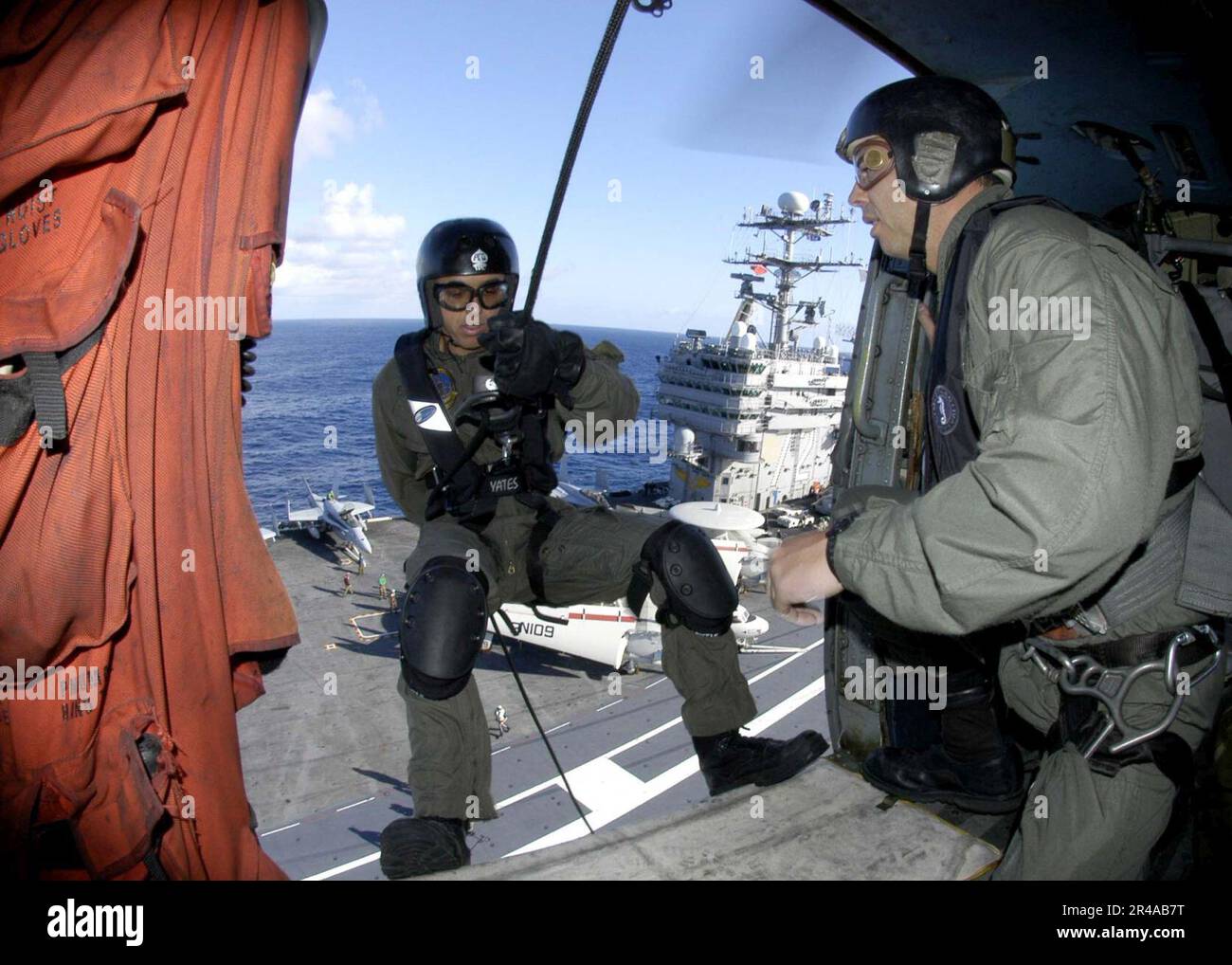 US Navy Personnel assigned to Explosive Ordnance Disposal Mobile Unit ...