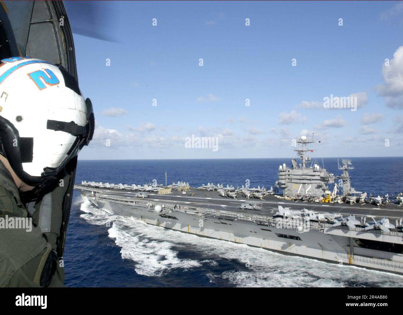 US Navy A crew member assigned to Explosive Ordnance Disposal Mobile ...