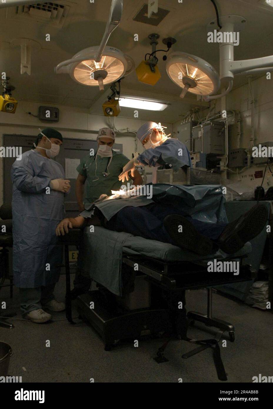 US Navy Crew members assigned to the medical department aboard the ...