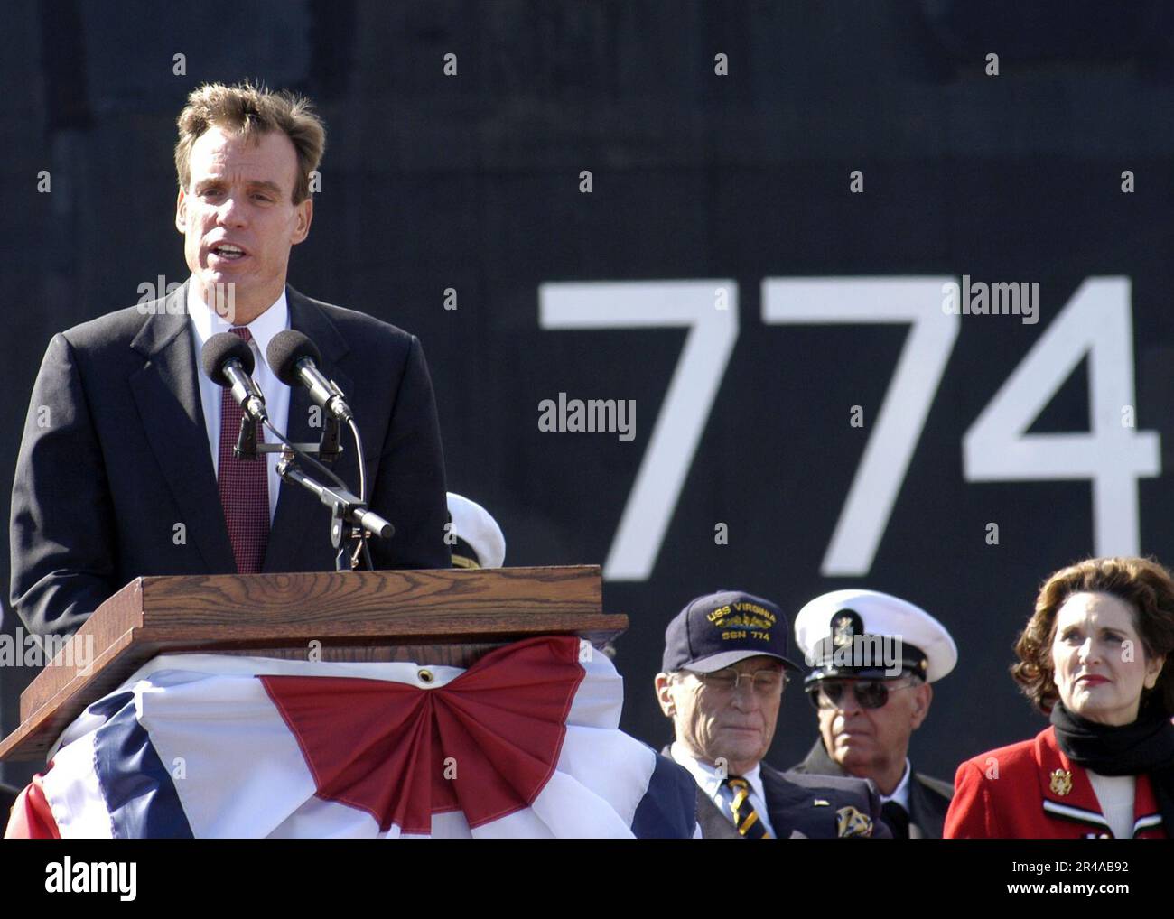 US Navy Virginia Governor Mark R. Warner speaks to the crowd at the ...