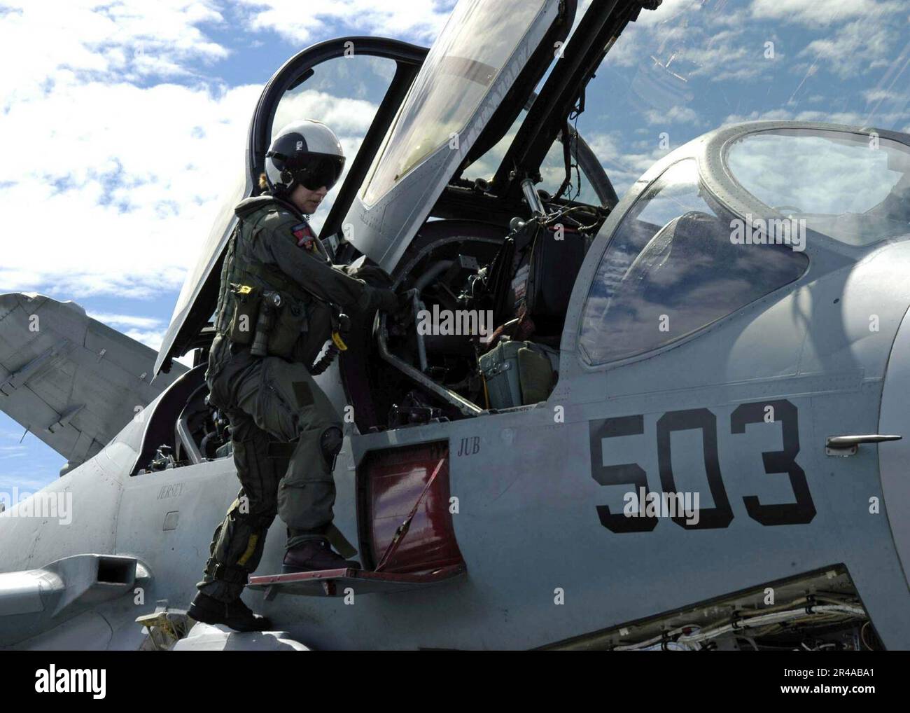 US Navy An Electronic Countermeasures Officer (ECMO) climbs into her EA ...