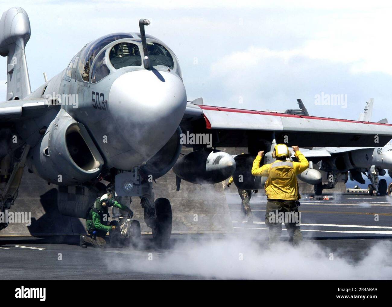 US Navy An Aviation Boatswain's Mate directs an EA-6B Prowler assigned ...
