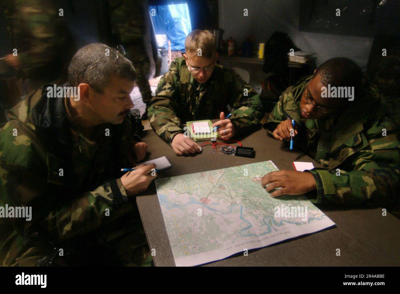 US Navy Photographer's Mate 1st Class left, Hospital Corpsman 2nd Class ...