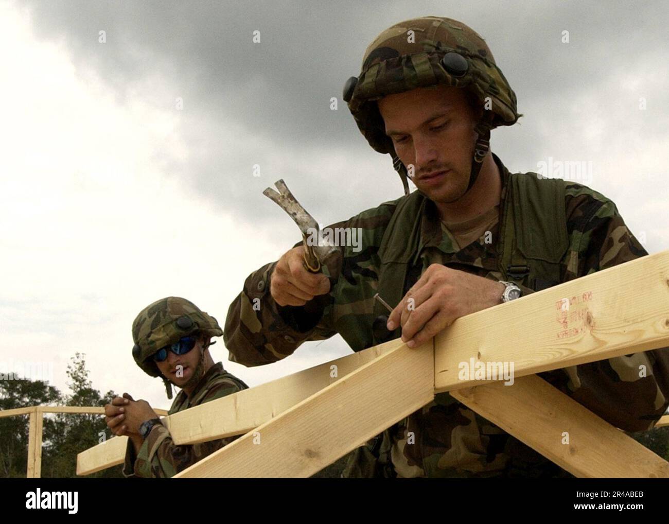 US Navy Seabees assigned to Naval Mobile Construction Battalion One ...
