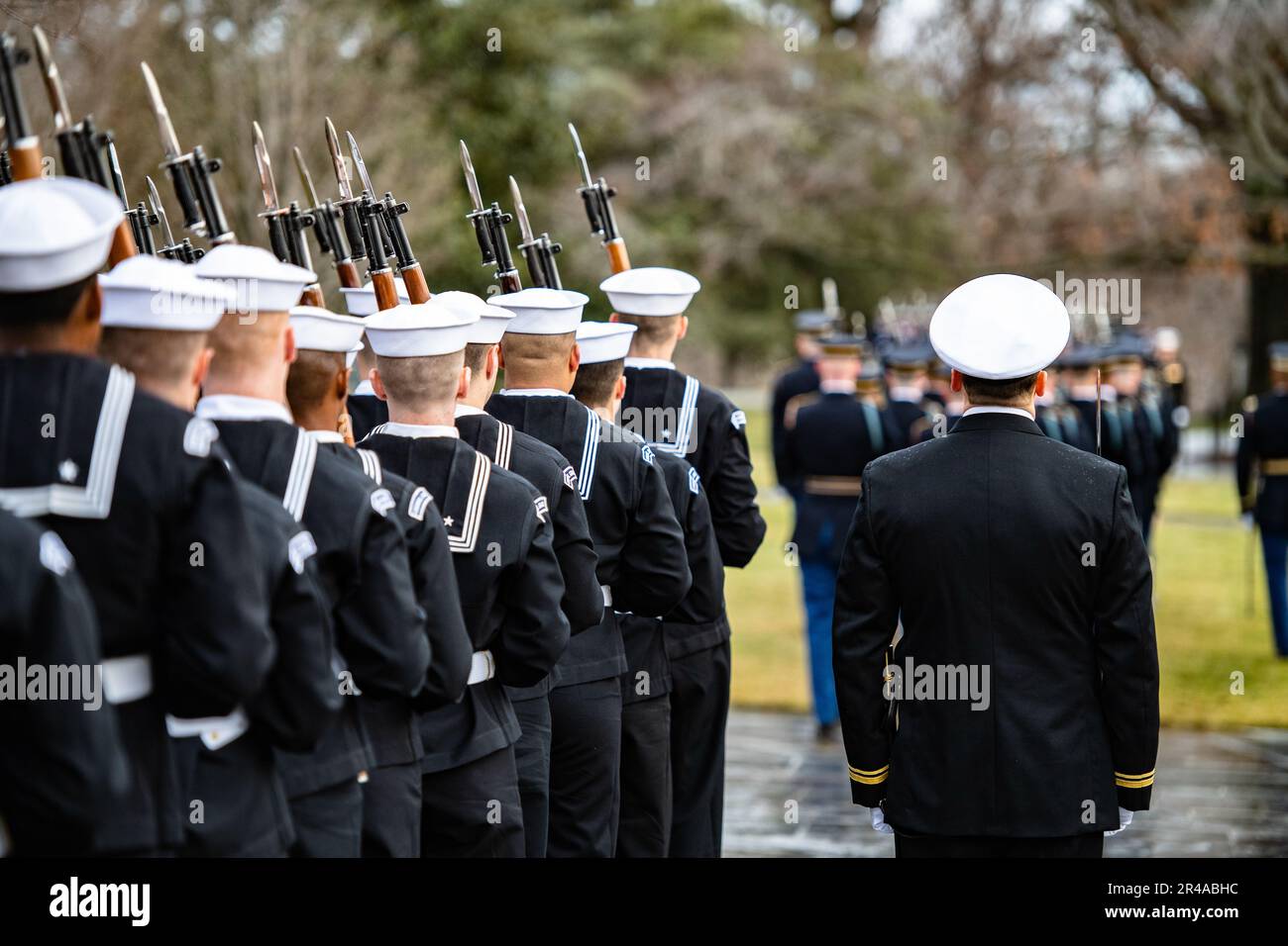 Service members from the U.S. Navy Honor Guard participate in an Armed ...
