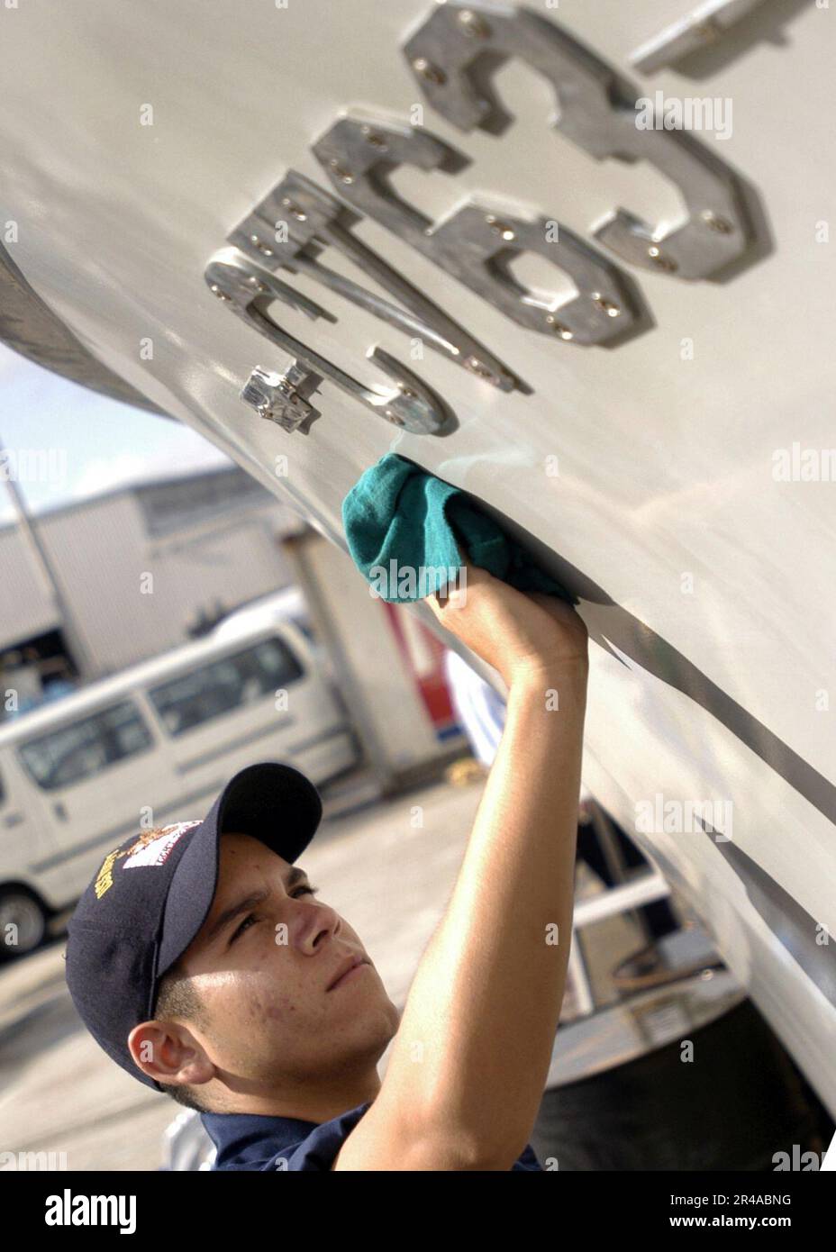US Navy Seamen Cesar Zepeda of San Diego, Calif., waxes the captain's ...
