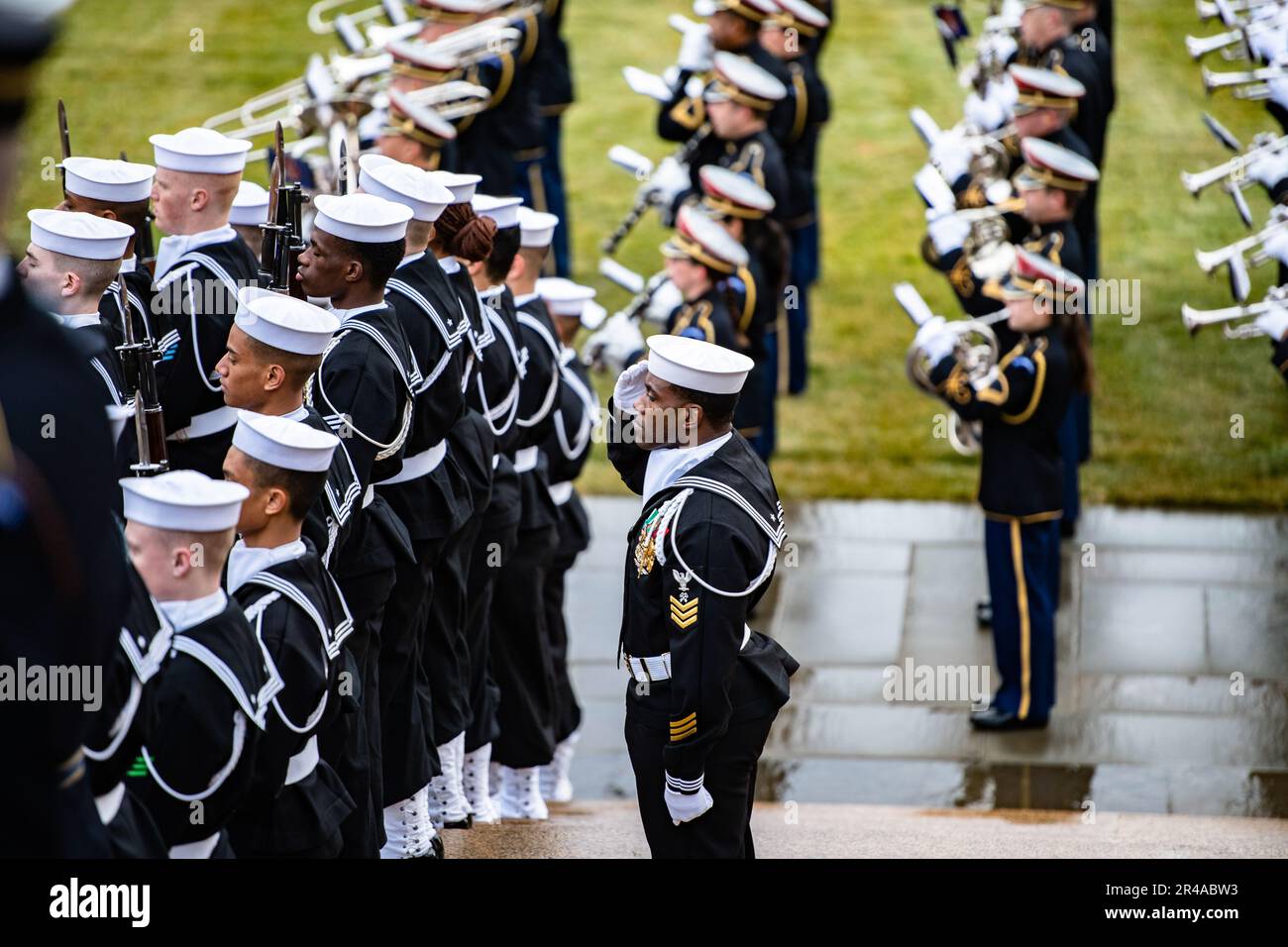 Service members from the U.S. Navy Honor Guard participate in an Armed ...