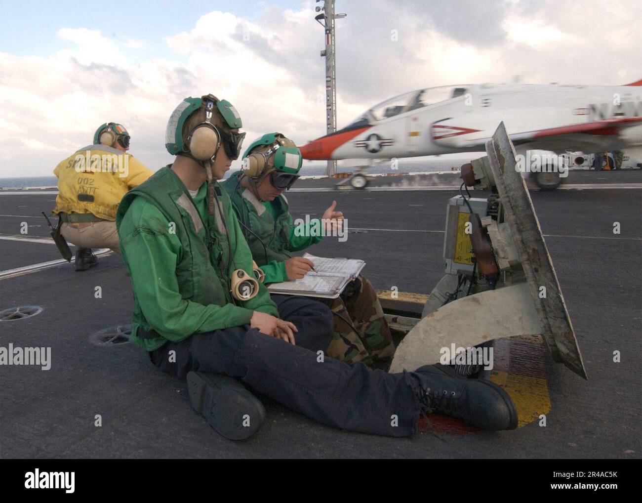 US Navy Flight deck crew launch a T-45 ''Goshawk'' assigned to Training ...