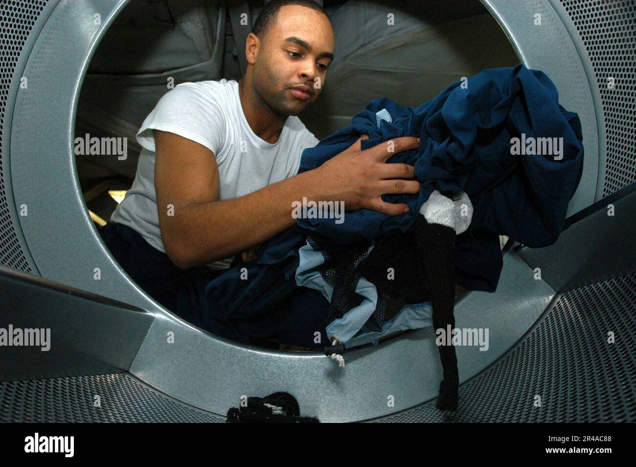 US Navy Aviation Ordnanceman Devon Brathwaite assigned to Weapons ...