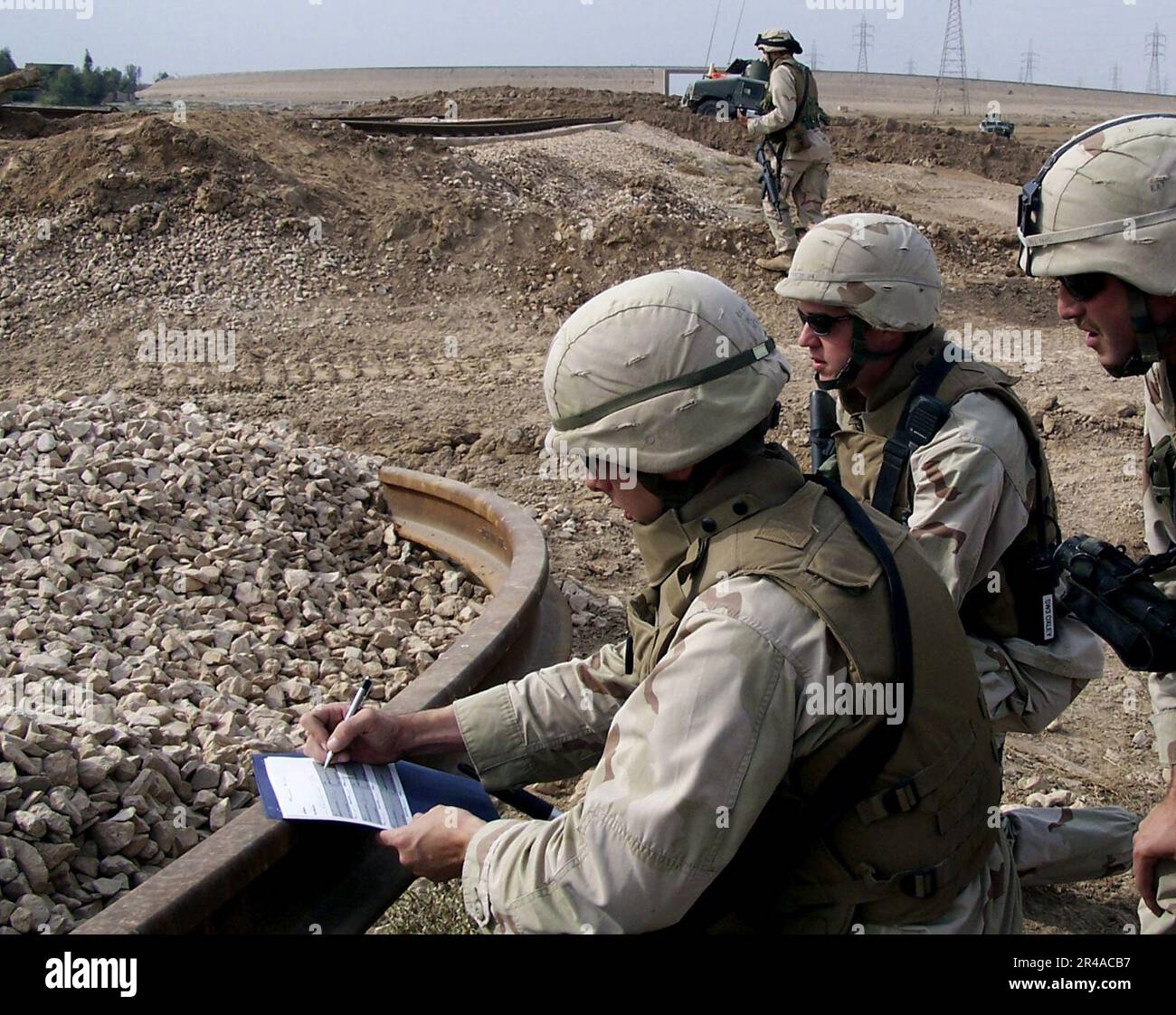 US Navy Equipment Operator 1st Class left, Steelworker 2nd Class and ...