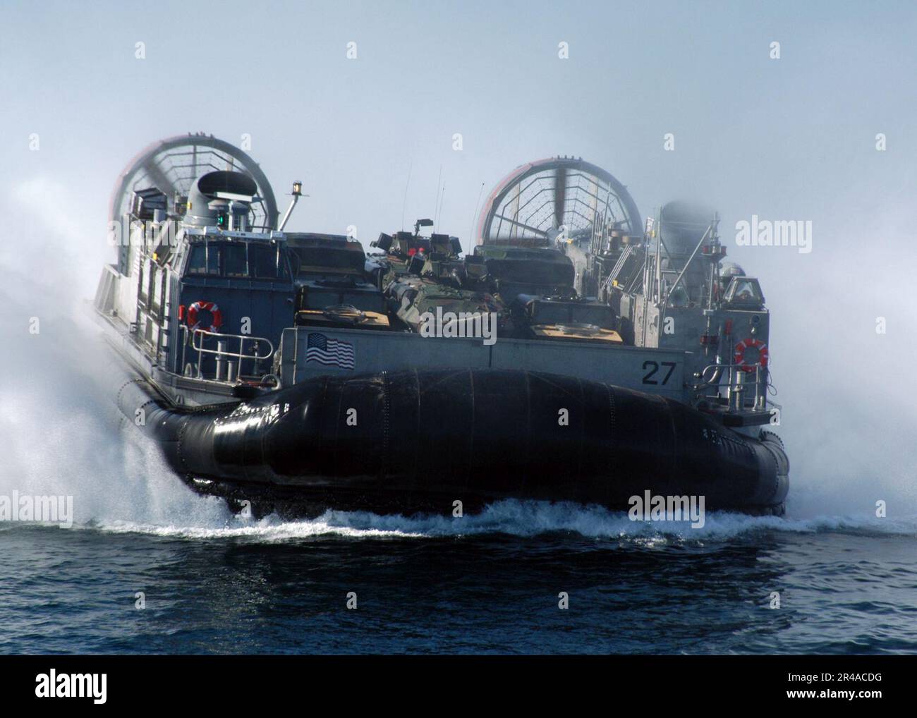 US Navy A Landing Craft Air Cushion (LCAC) assigned to Assault Craft Unit Four (ACU-4) returns ...