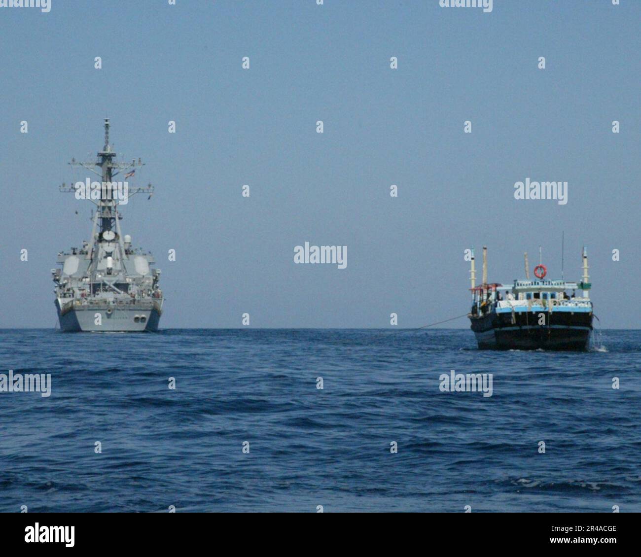 US Navy The guided missile destroyer USS TheSullivans (DDG 68) provides ...