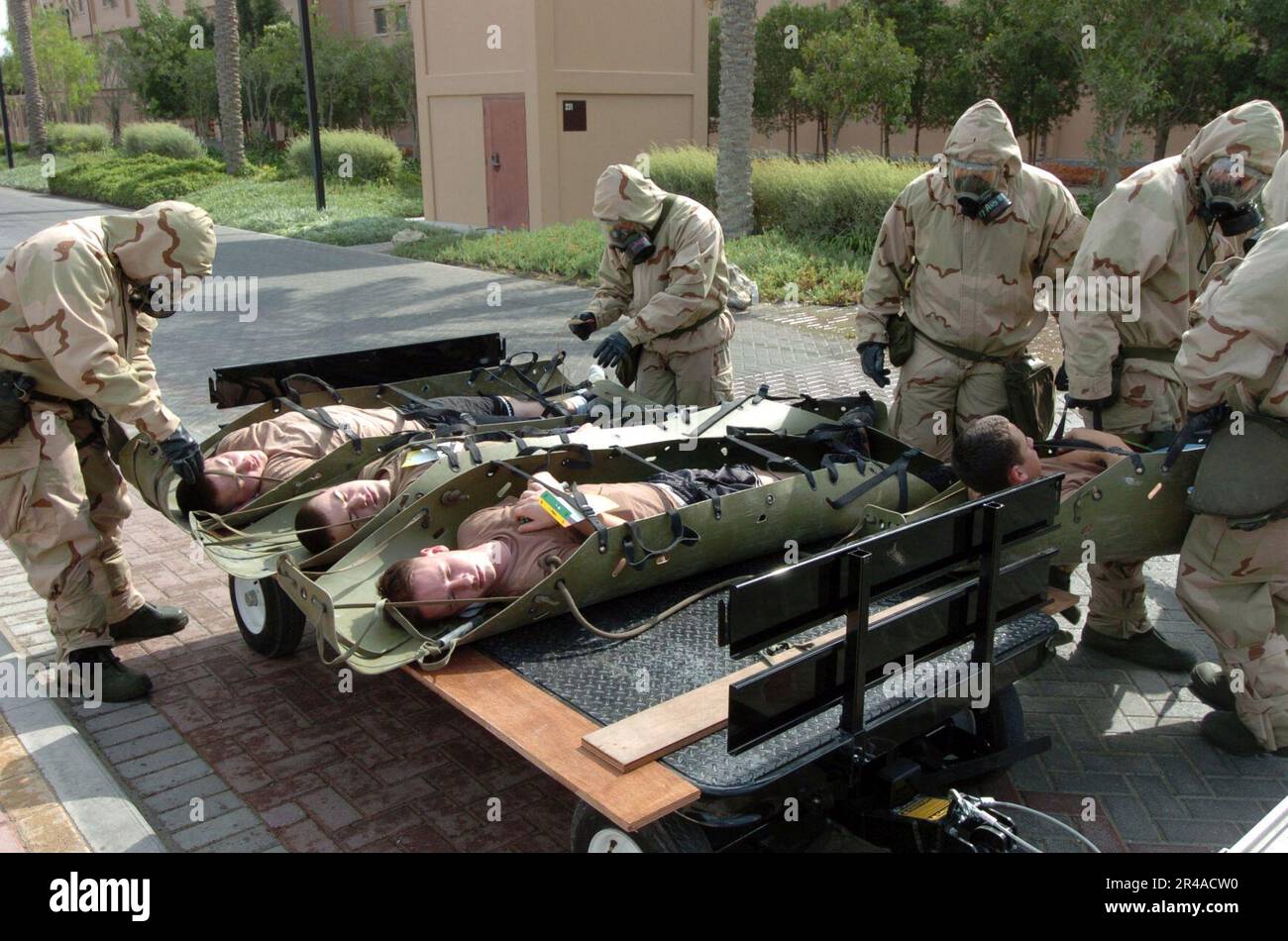 US Navy Emergency Response Team members prepare victims for ...