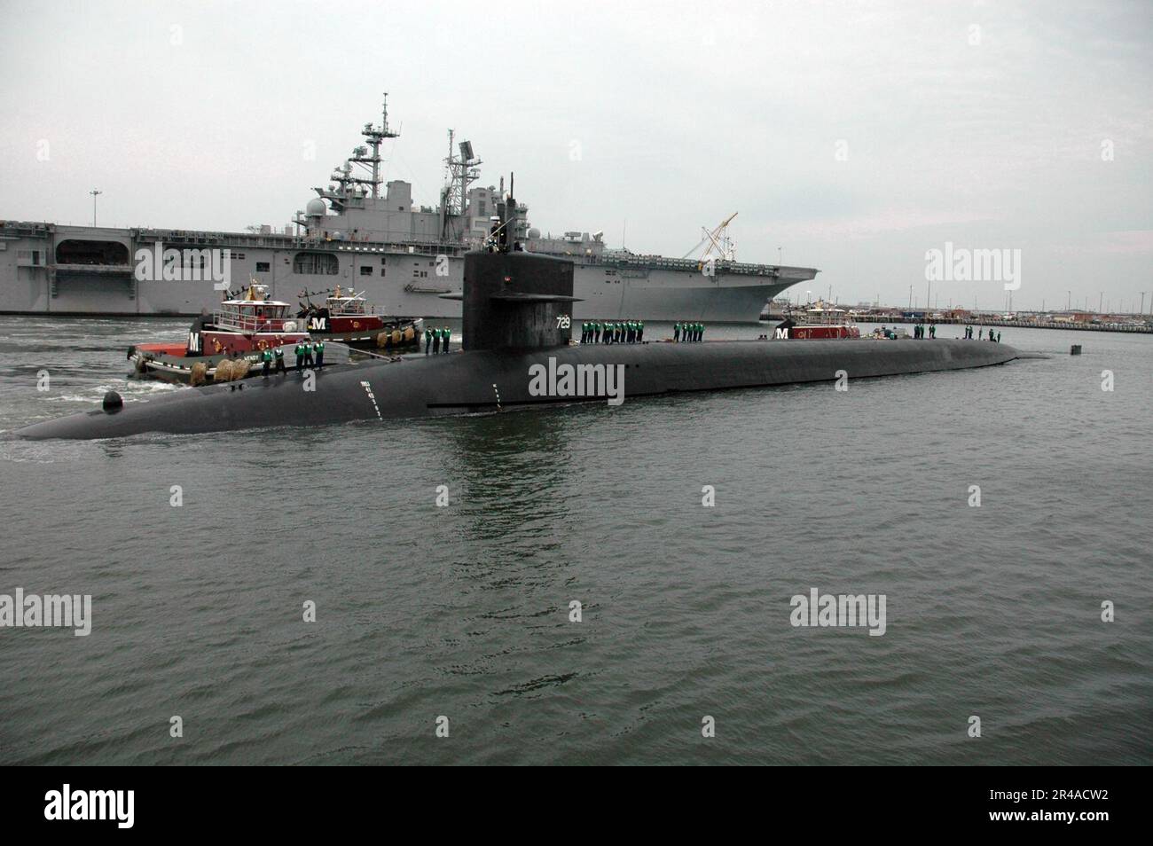 US Navy The Ohio-class submarine USS Georgia (SSBN 729) is towed past ...
