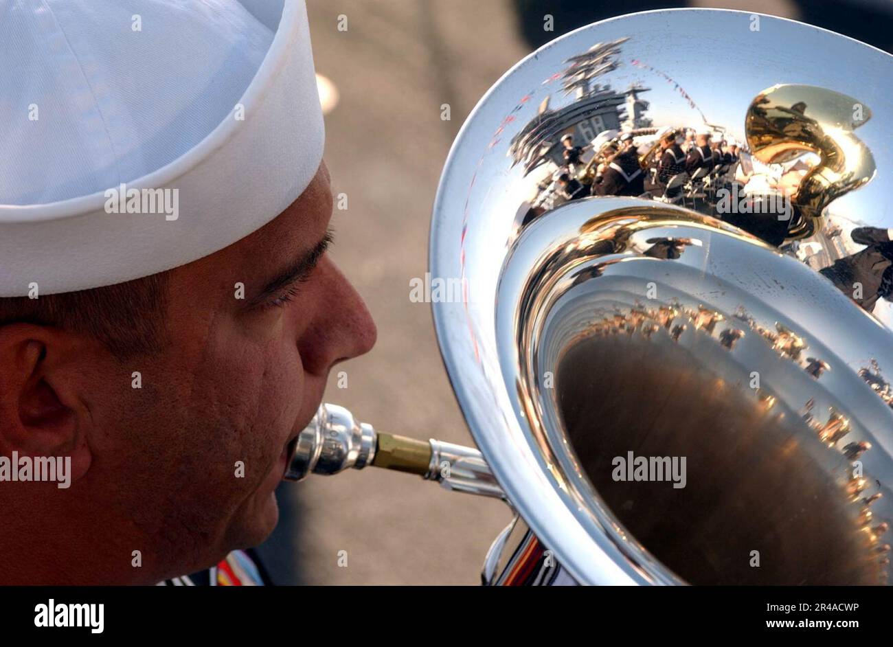 US Navy A Navy Band member performs during a change of command ceremony ...