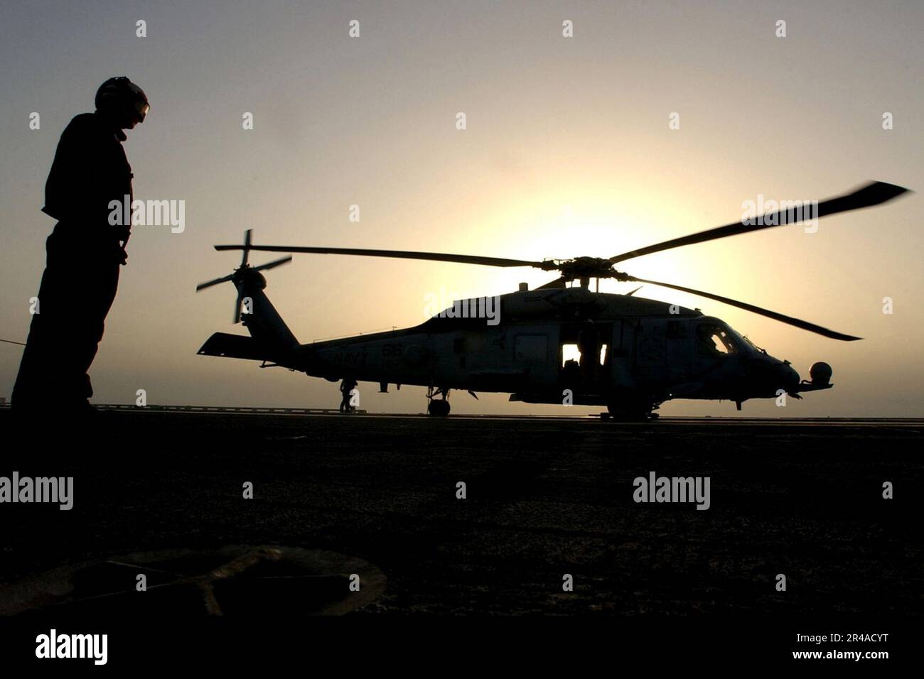 US Navy An HH-60H Seahawk helicopter prepares to launch for a routine mission from the flight ...
