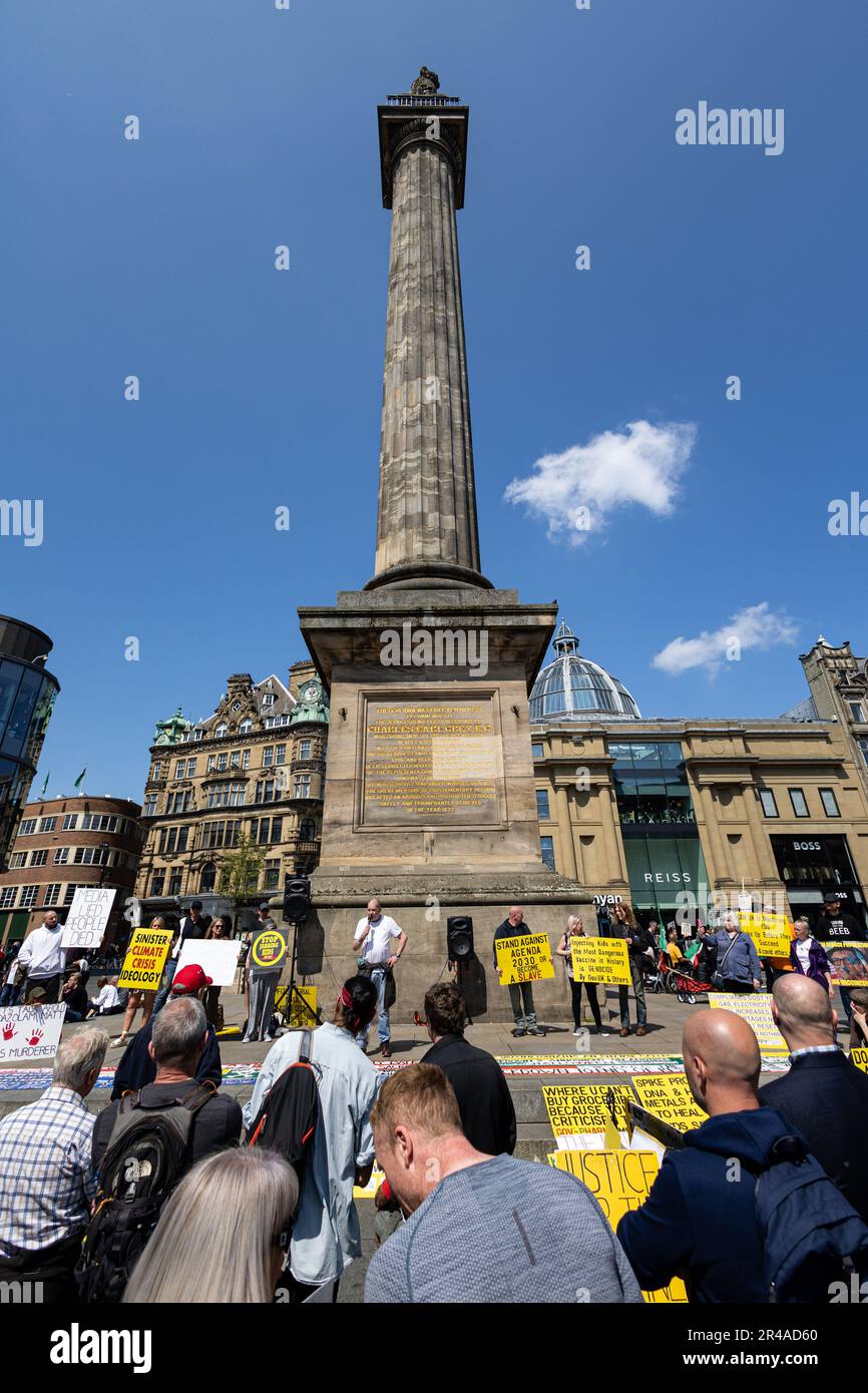 A diverse group of people, gathered outside a building in a peaceful ...