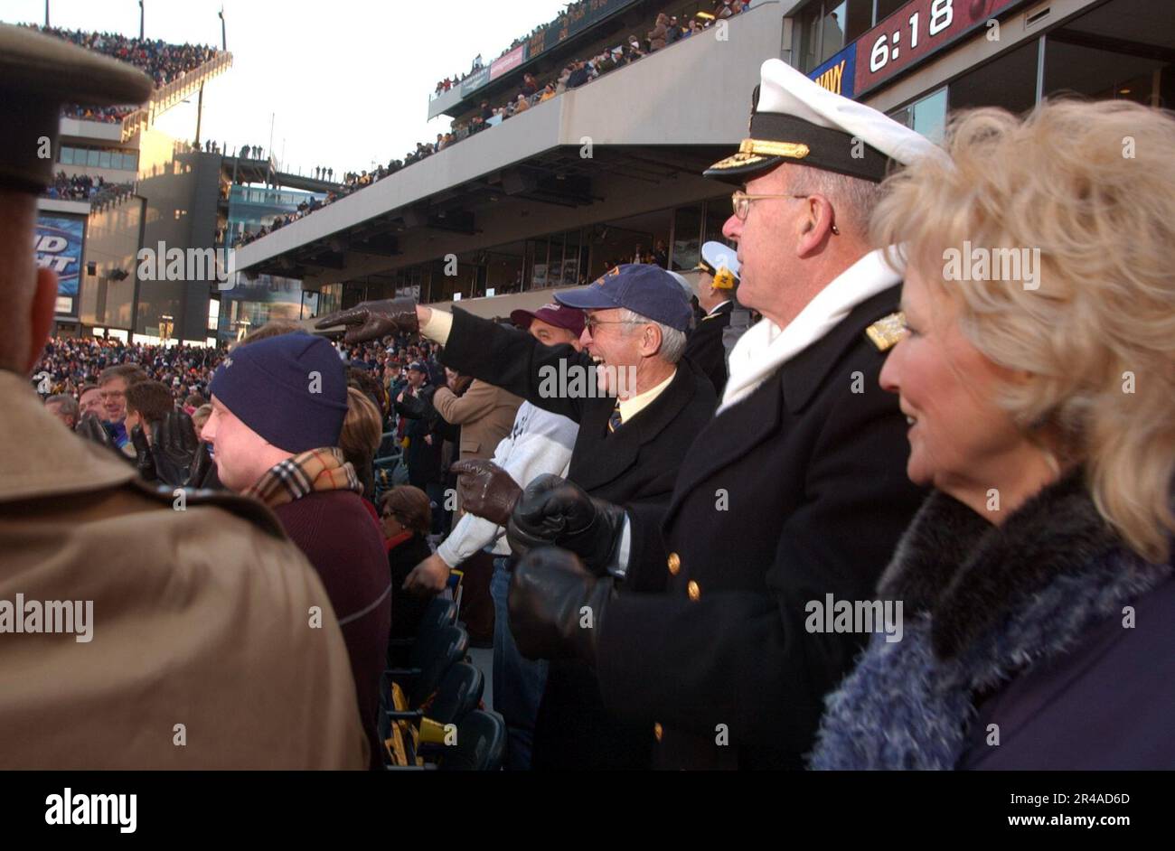 US Navy Secretary of the Navy Gordon R. England, center, celebrates ...