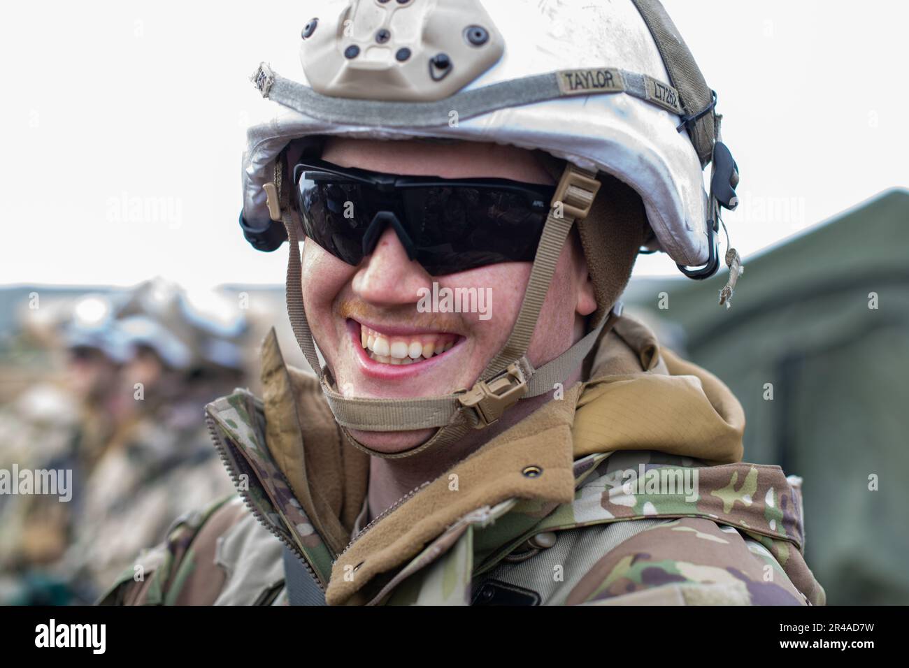 U.S. Army Spc. Logan Taylor, a paratrooper assigned to Charlie Company ...