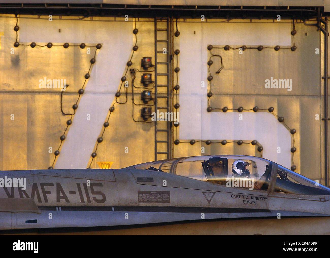 US Navy An F-A-18A Hornet taxies in front of the island structure on ...