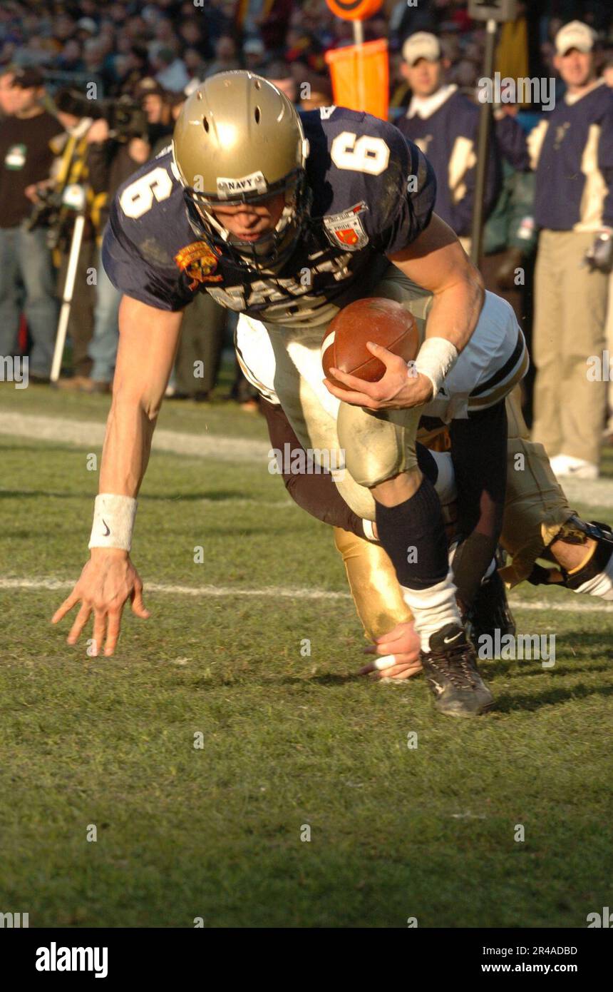 US Navy Navy Quarter Back Aaron Polanco scores for Navy at the 105th ...