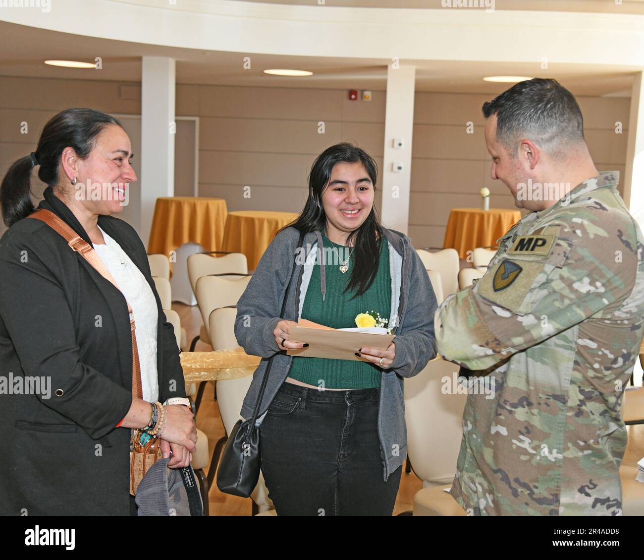 Gold Star Spouse Anja Camila Bendeck Fernandez, center, Ms. Hannia ...