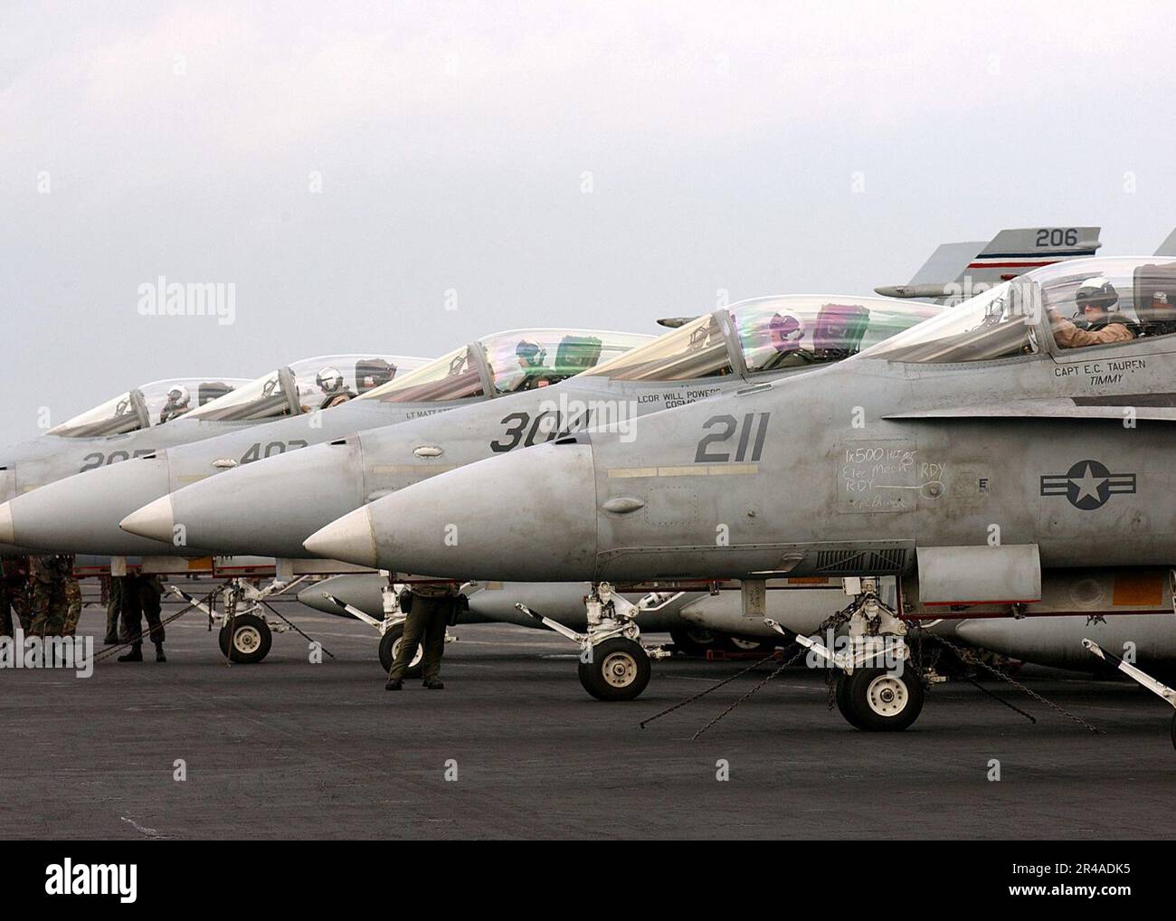 US Navy F-A-18 Hornet pilots, assigned to Carrier Air Wing Three (CVW-3 ...