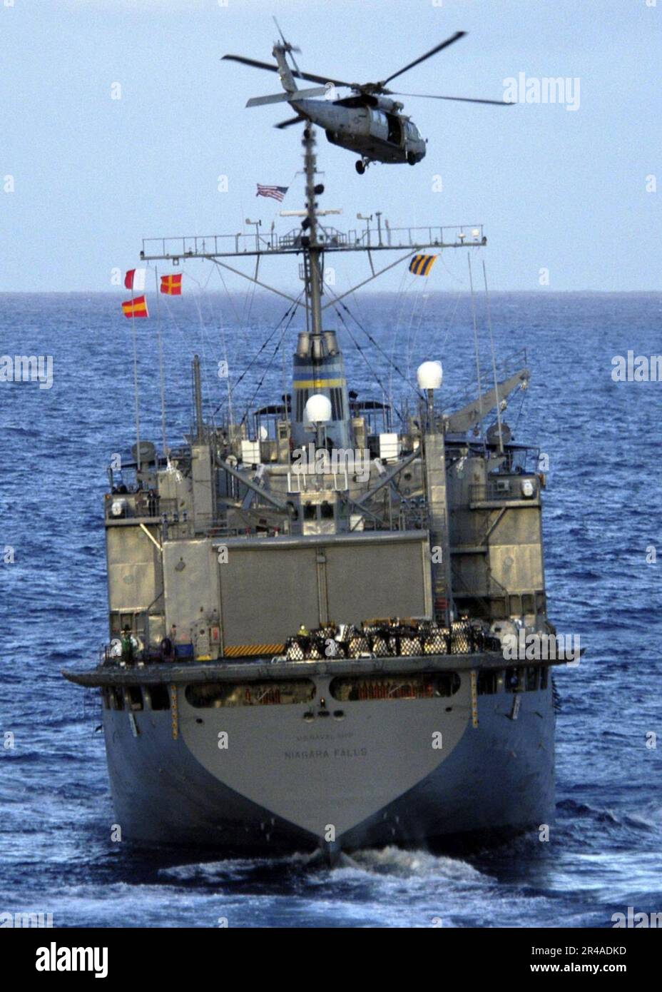 US Navy An MH-60S Knighthawk hovers over the Military Sealift Command ...