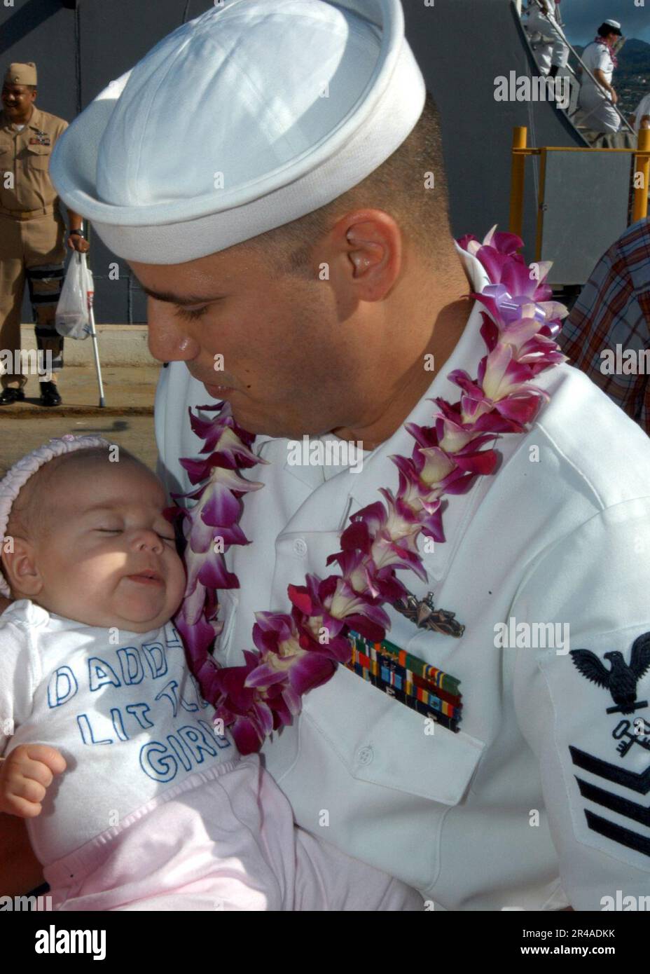 US Navy Storekeeper 1st Class assigned to the Arleigh Burke-class ...