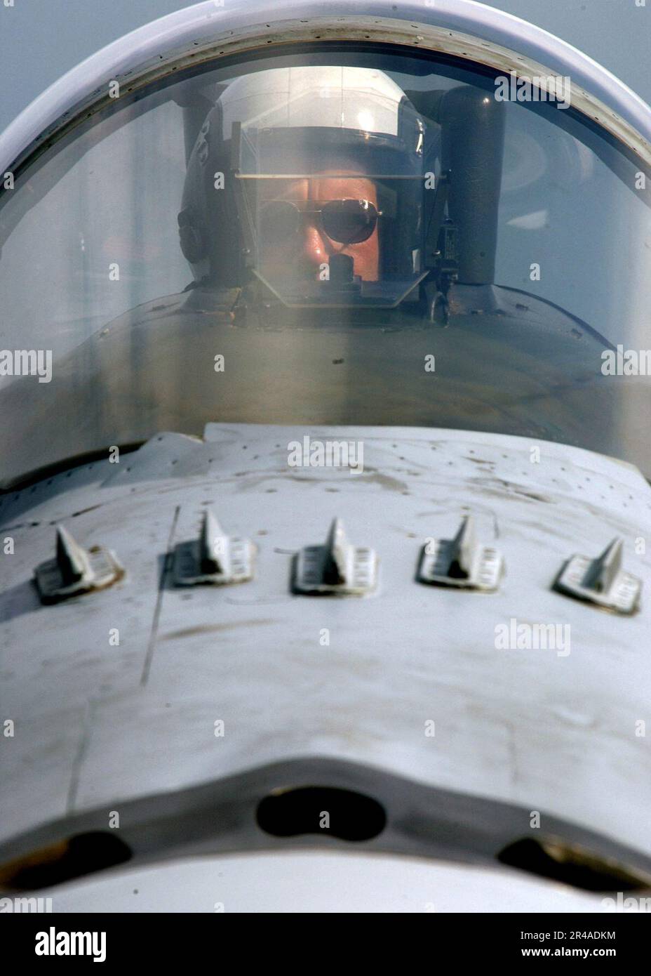US Navy A Marine Corps pilot waits patiently in the cockpit of his F-A ...