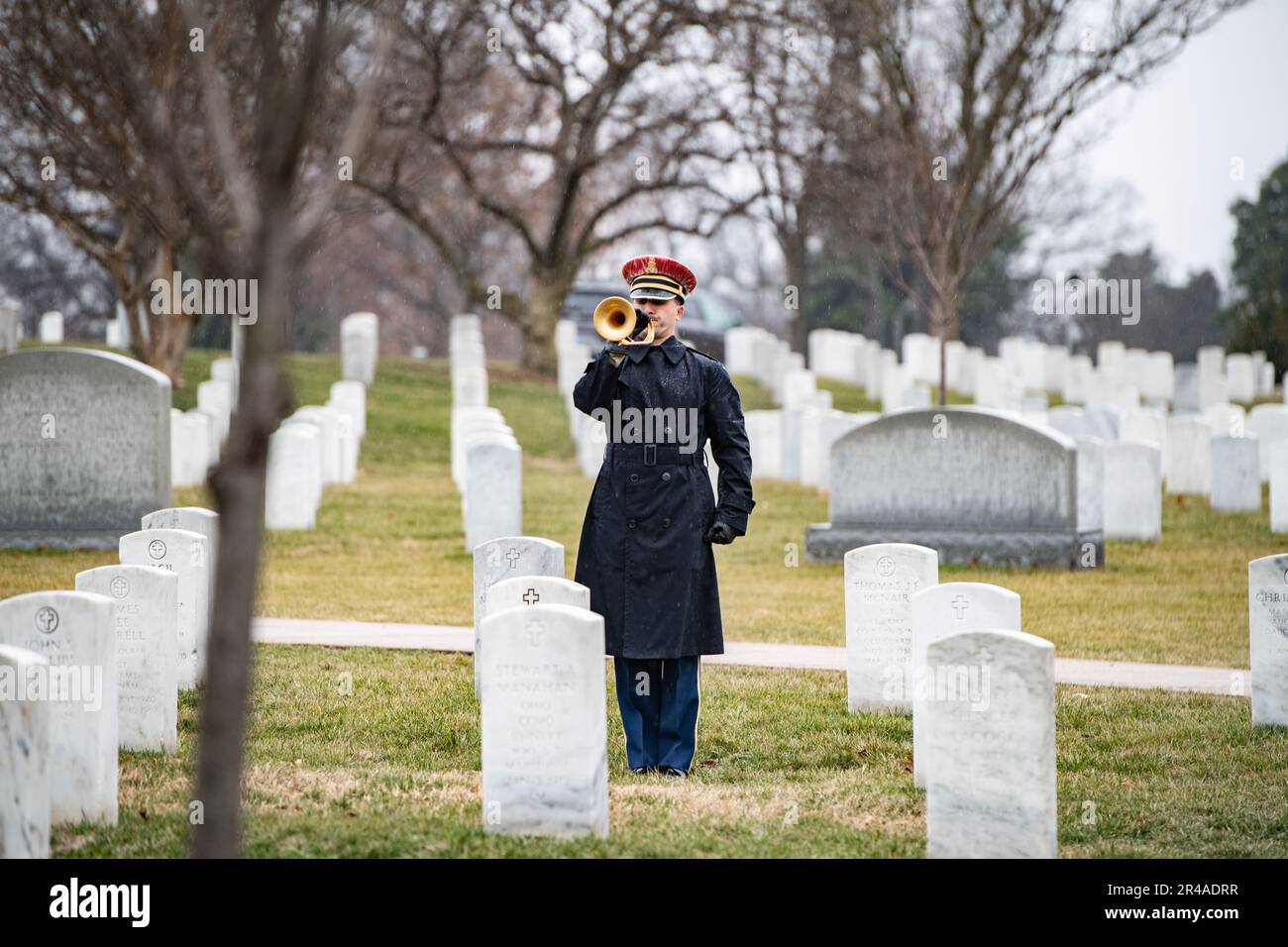 A bugler from the U.S. Army Band, "Pershing's Own", plays "Taps" during ...