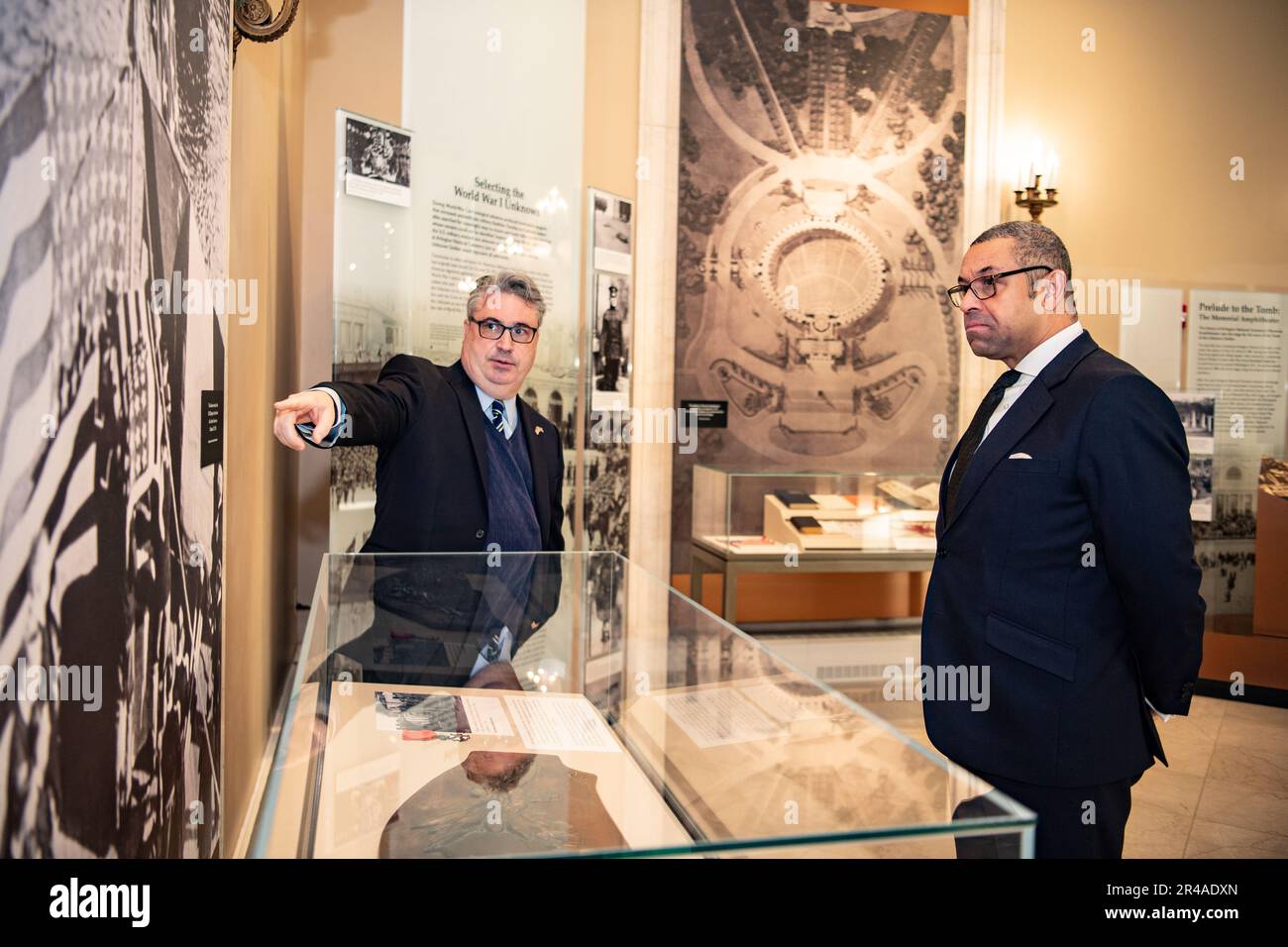 Rod Gainer (left), curator, Arlington National Cemetery, gives a tour ...