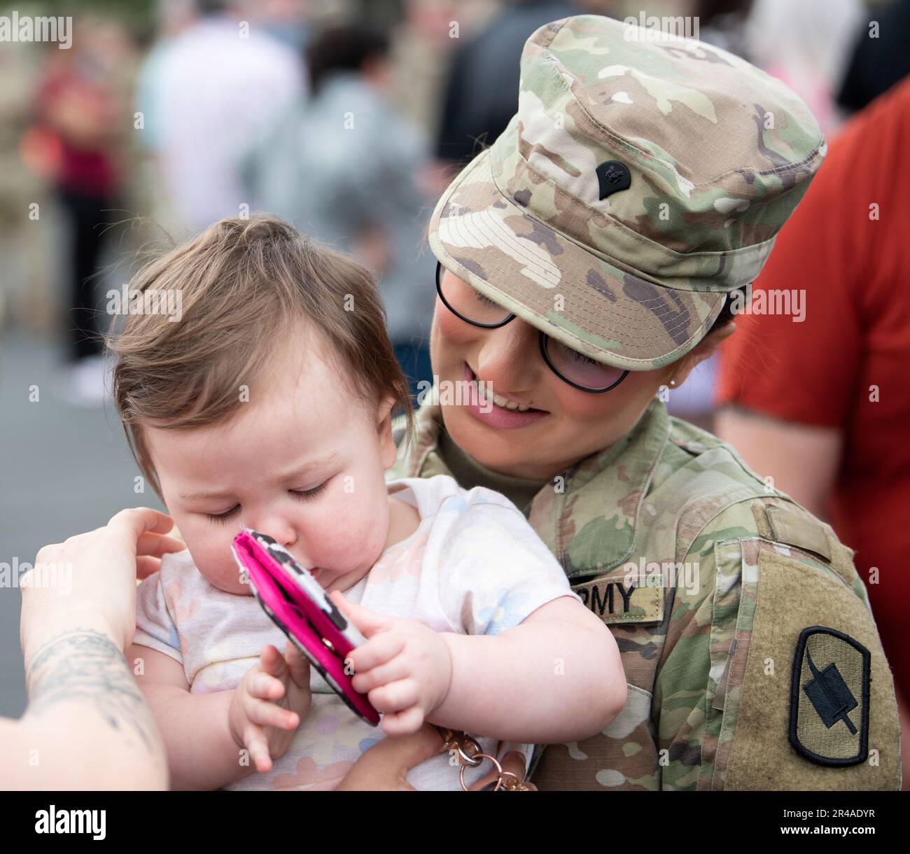 NORTH LITTLE ROCK, Ark. — Spc. Candace Austin holds her Goddaughter ...
