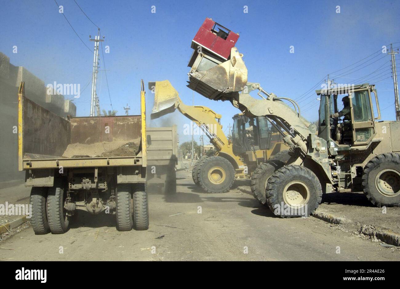 US Navy A U.S. Marine Corps front-end loader joins its Army counterpart ...