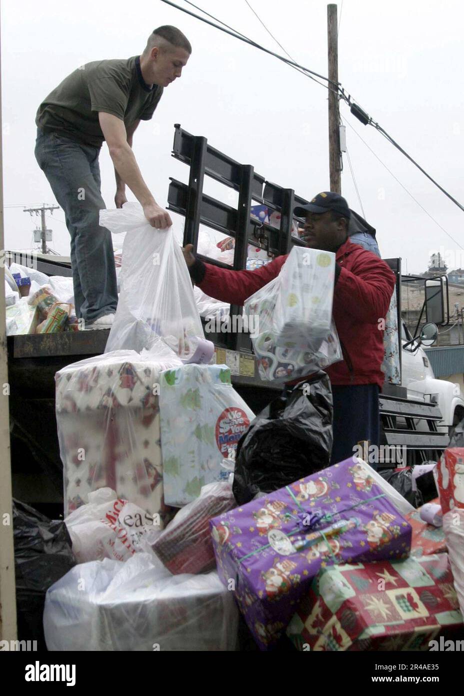 US Navy Airman and Storekeeper 1st Class assigned to USS Carl Vinson's ...