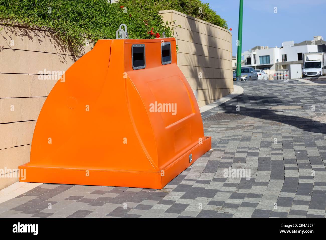 Garbage container on city street Stock Photo - Alamy