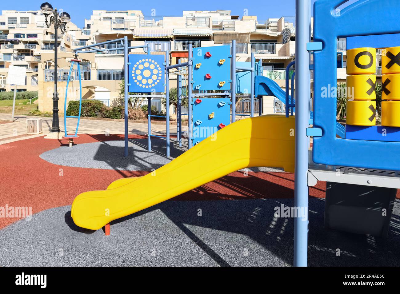 View of children's playground with slide at sea resort Stock Photo - Alamy