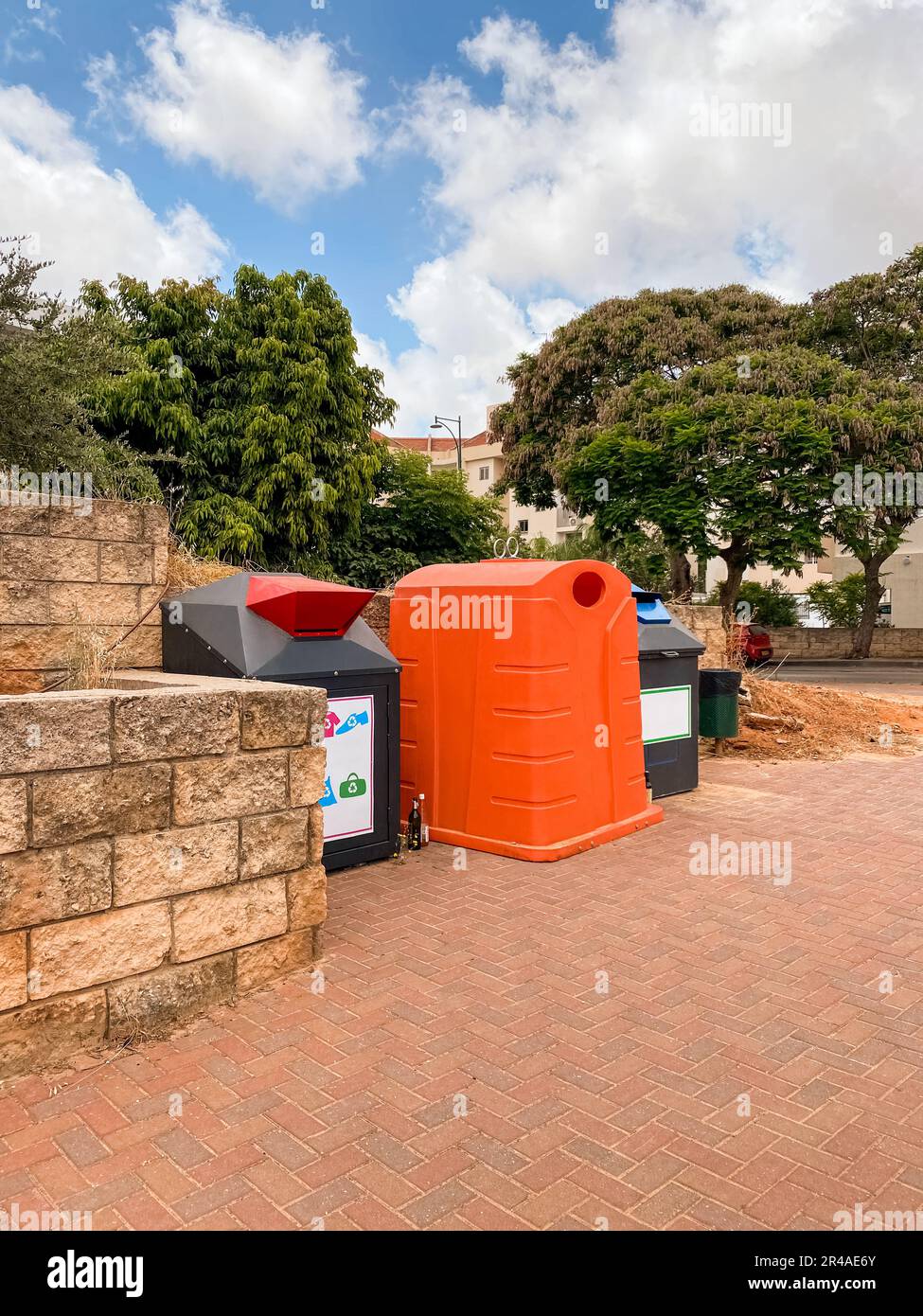 Garbage containers on city street Stock Photo - Alamy