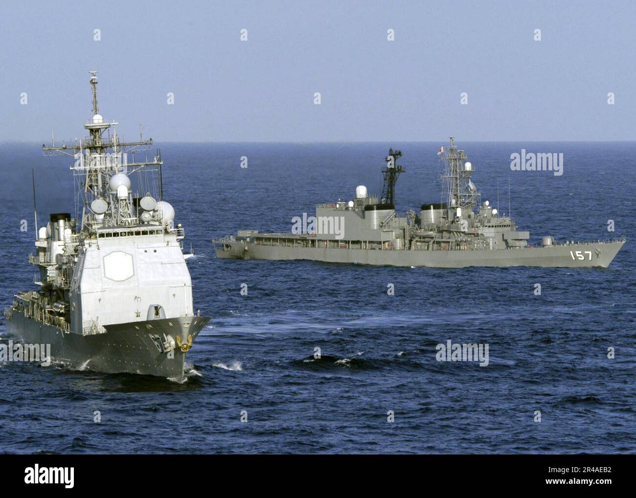 US Navy The guided missile destroyer USS Shiloh (DDG 67) and the ...