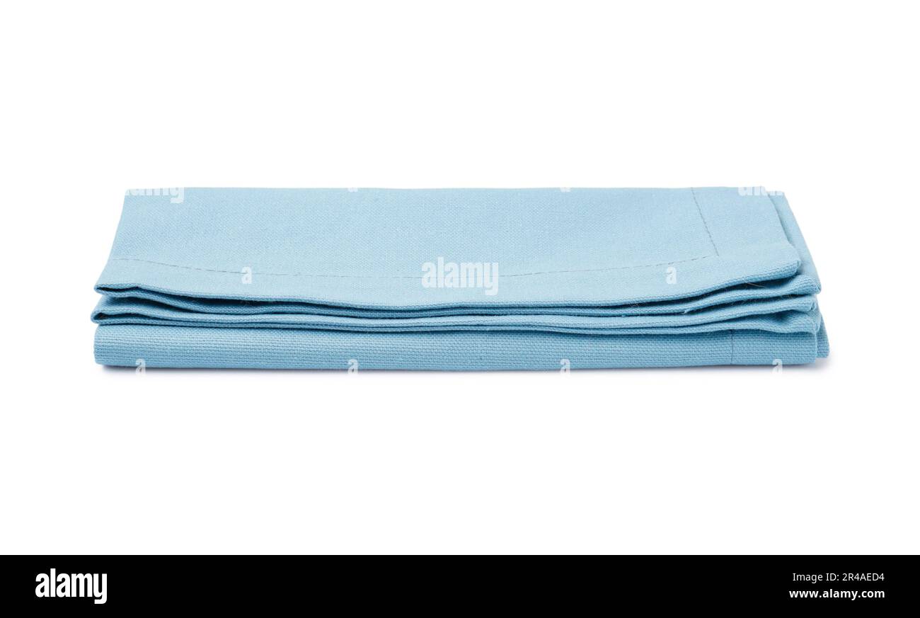 Blue folded napkin isolated on white background Stock Photo - Alamy