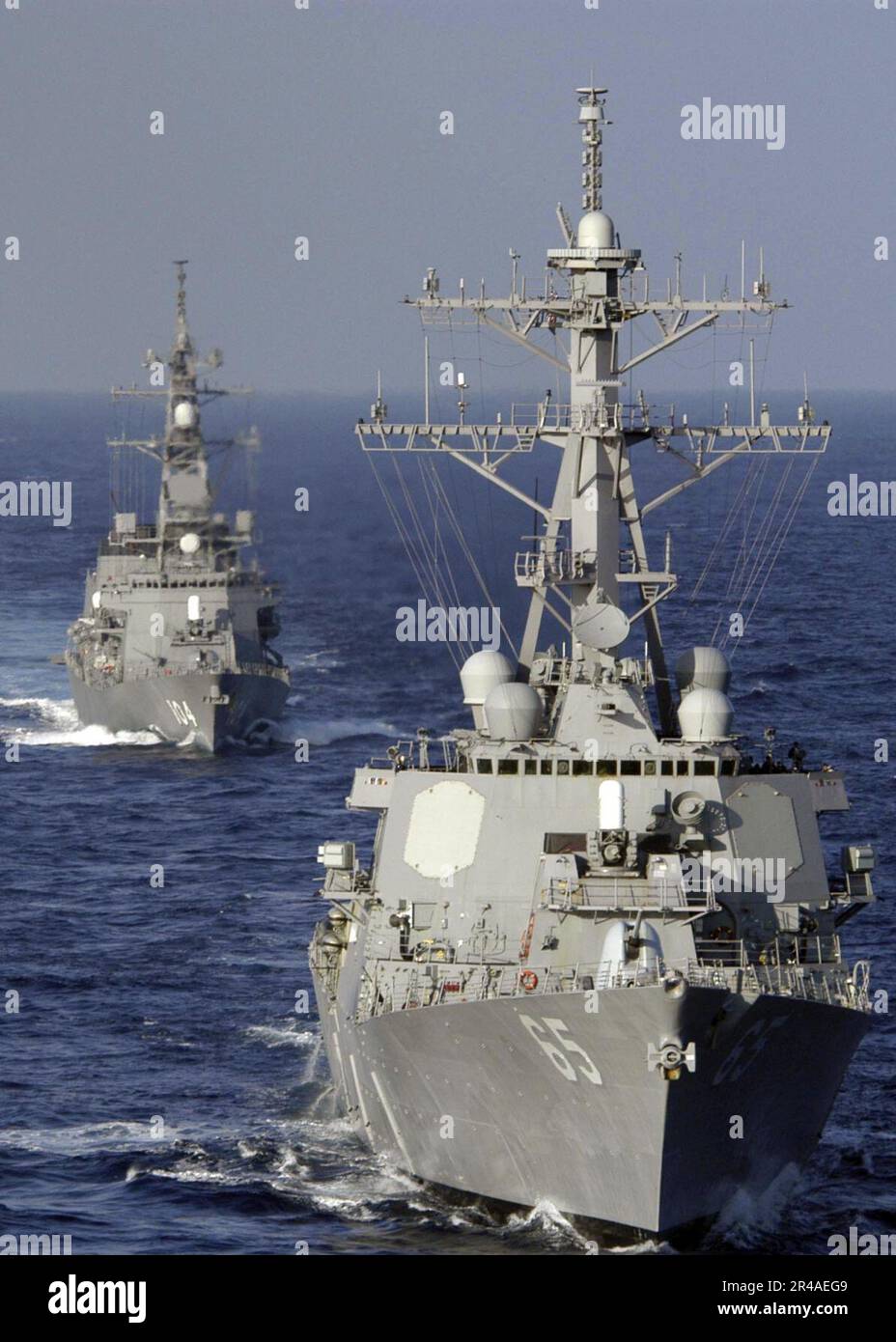 US Navy The guided missile destroyer USS Benfold (DDG 65) and the ...